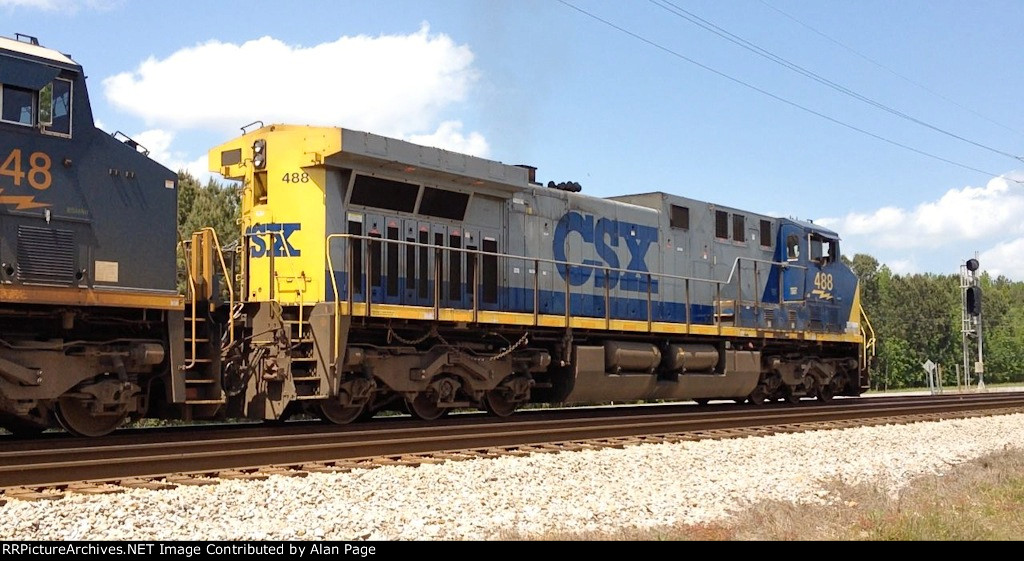 CSX 488, 3148, and 7663 roll NB